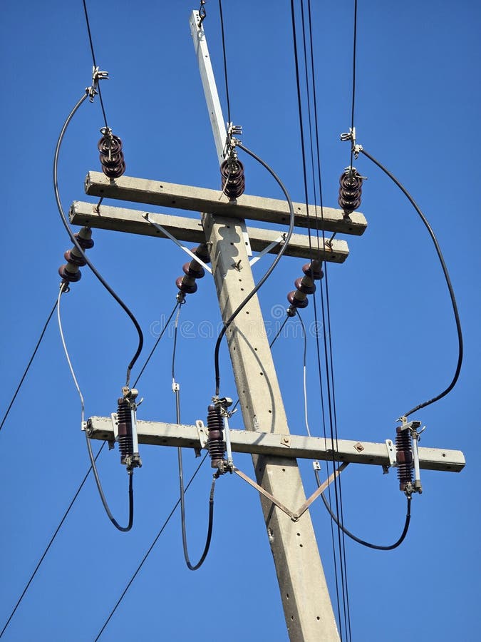 High Voltage Post on the Blue Sky Background Stock Photo - Image of ...