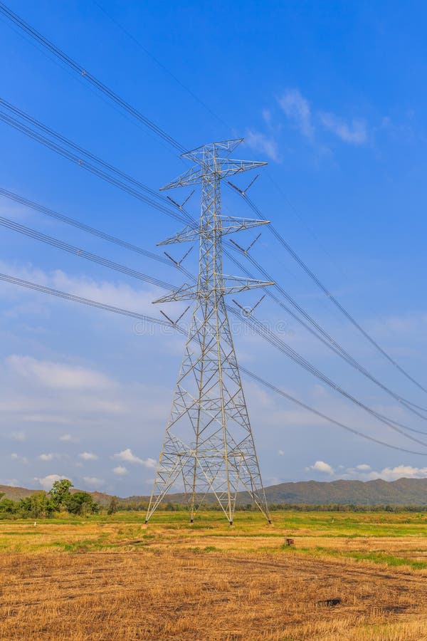High Voltage Post and Power Lines with Blue Sky Stock Photo - Image of ...