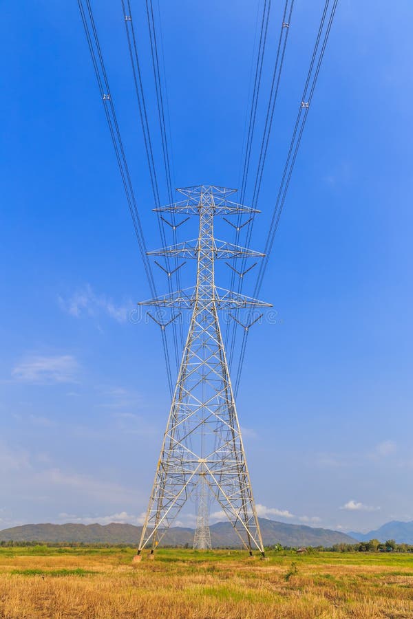High Voltage Post and Power Lines with Blue Sky Stock Image - Image of ...
