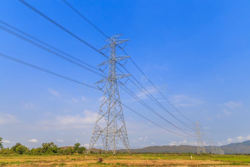 High Voltage Post and Power Lines with Blue Sky Stock Photo - Image of ...