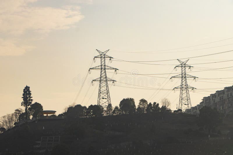 High Voltage Post or Transmission Towers with Tangled Electrical Wires ...
