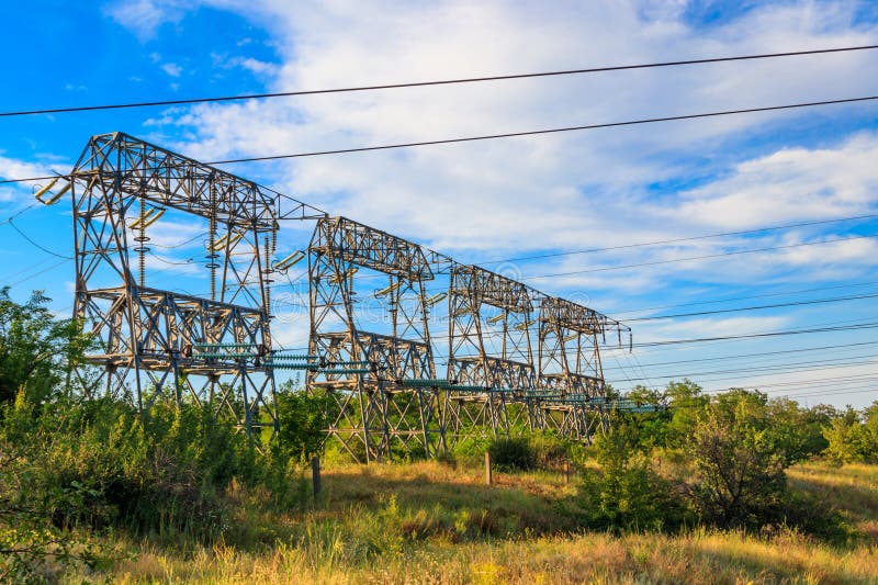 High Voltage Power Line Against Blue Sky Stock Photo - Image of outdoor ...