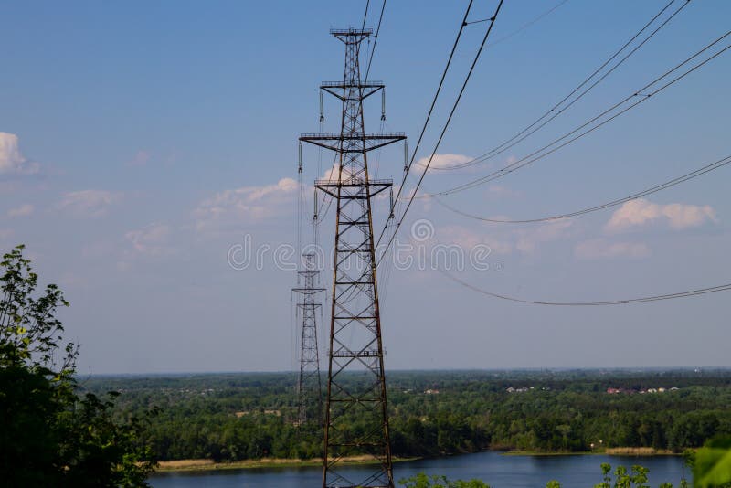 High Voltage Power Line Against Blue Sky Stock Photo - Image of pillar ...