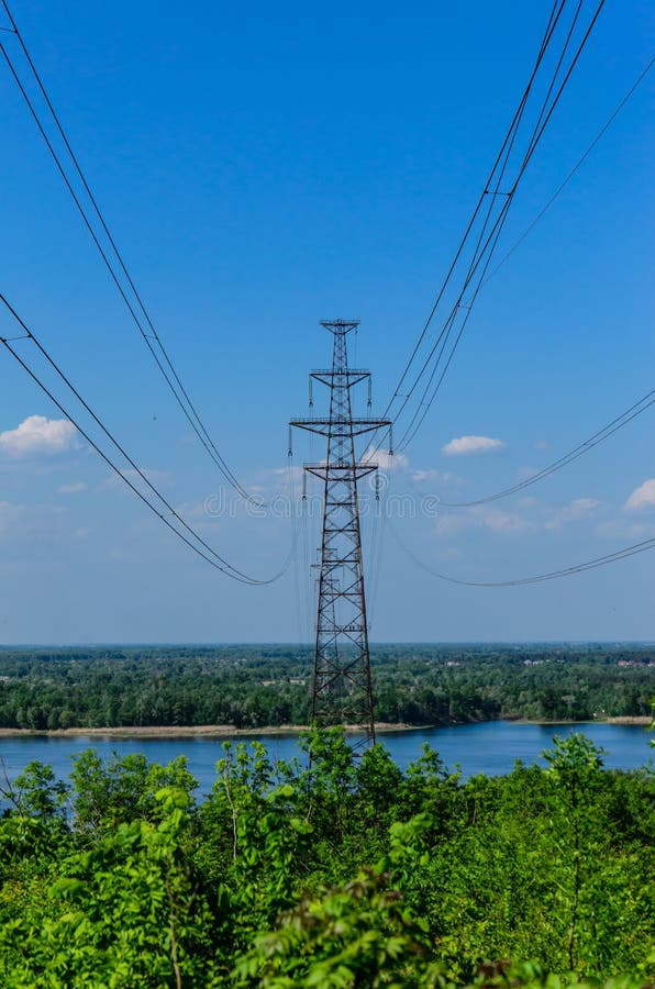 High Voltage Power Line Against Sky Stock Photo - Image of equipment ...