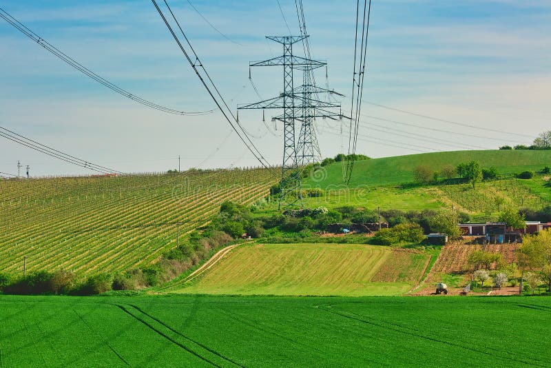 High Voltage Power Line in the Fields Stock Image - Image of industrial ...