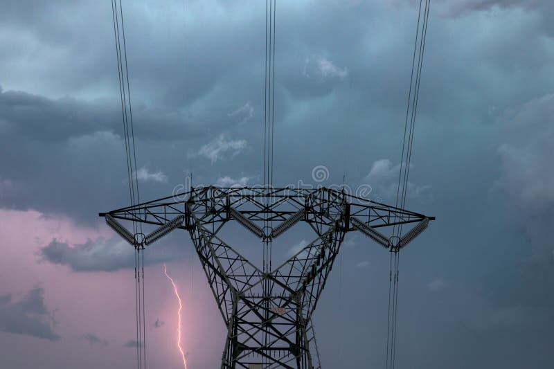 High Voltage Power Line with Lightning and Thunderstorm on the Evening ...