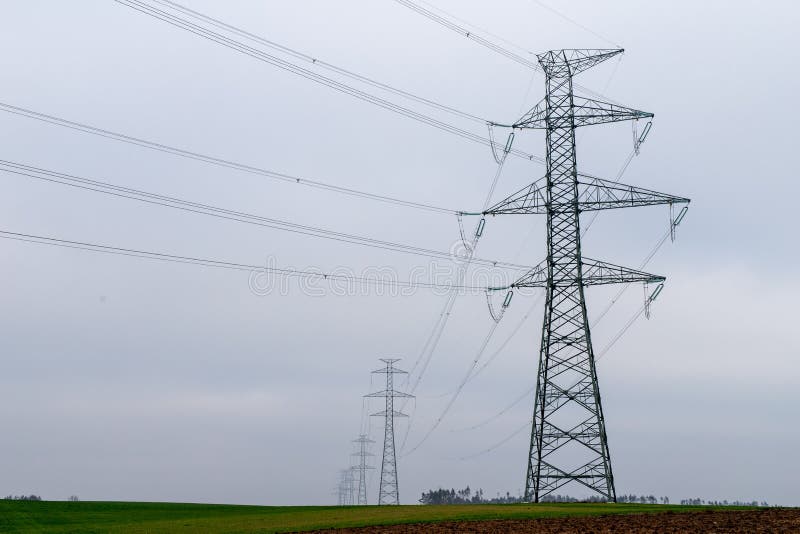 High Voltage Power Line. Overhead Electrical Cables Routed Throu Stock ...