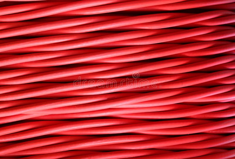 High Voltage Power Line with Red Insulated Cable Against a Background ...