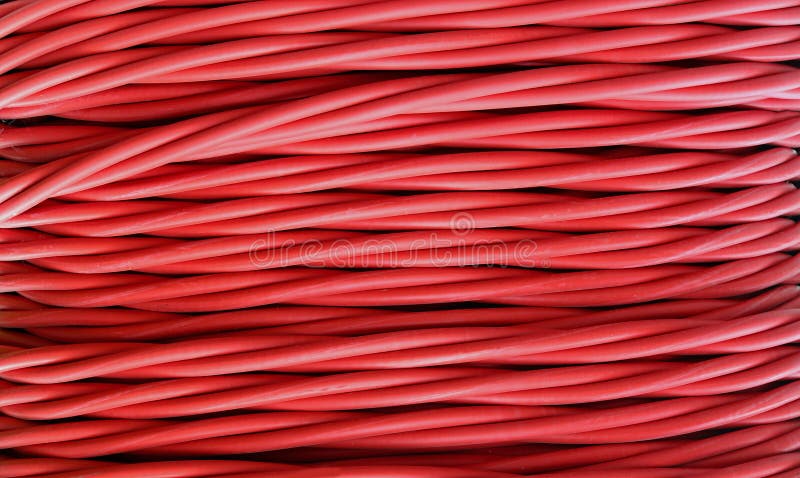 High Voltage Power Line with Red Insulated Cable Against a Background ...