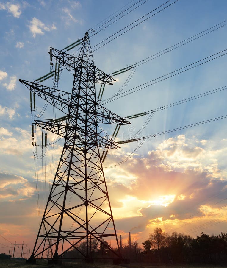 High-voltage Power Lines on the Background of a Beautiful Cloudy Sunset ...
