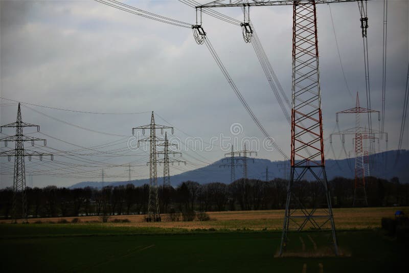 High Voltage Power Lines on Background of Blue Sky Stock Image - Image ...