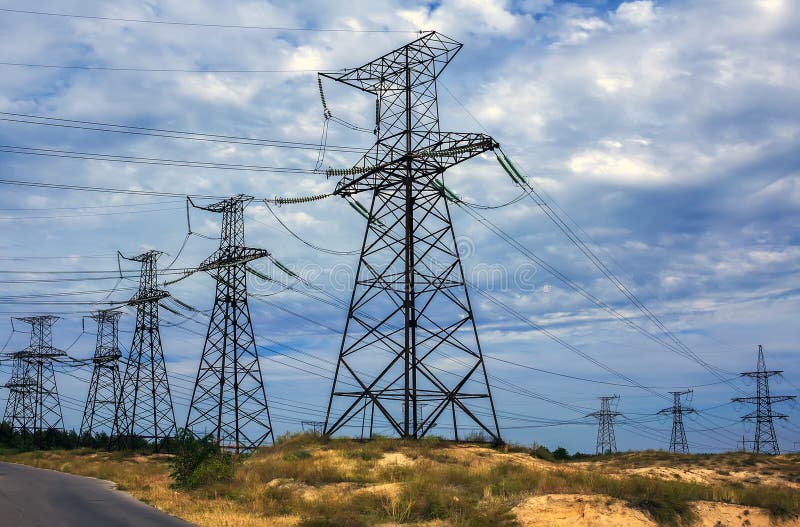 High-voltage Power Lines on a Background of Storm Clouds Stock Photo ...