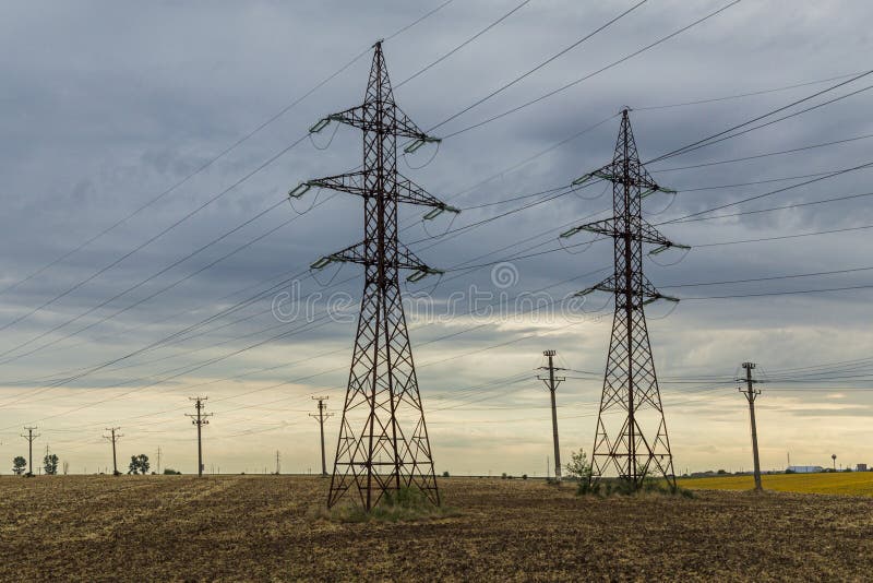 High voltage power lines stock photo. Image of environment - 377360298