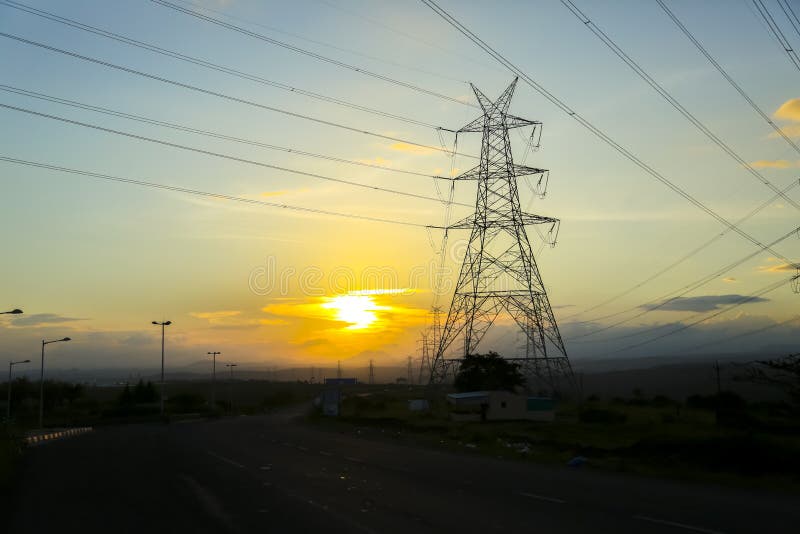 High-voltage Power Lines at Sunset,high Voltage Electric Transmission ...