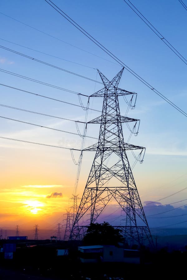 High-voltage Power Lines at Sunset,high Voltage Electric Transmission ...