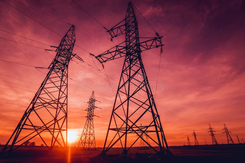 High-voltage Power Lines at Sunset. Electricity Distribution Station ...