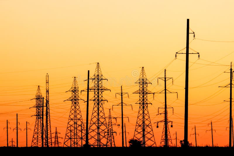 High Voltage Power Lines at Sunset Stock Photo - Image of silhouette ...