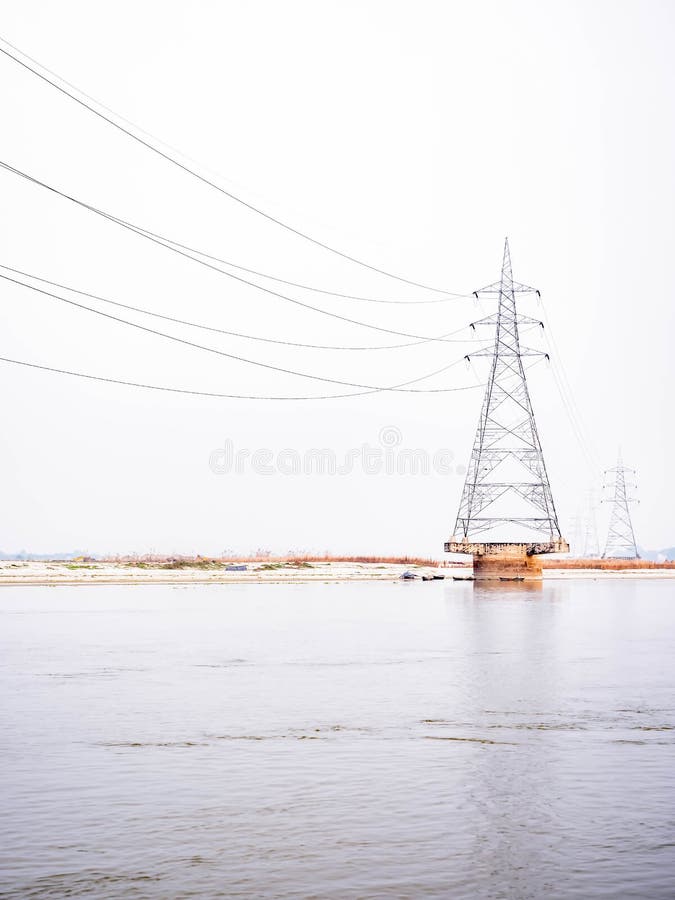 High Voltage Power Lines on Water Under Clear Sky with Copy Space in ...
