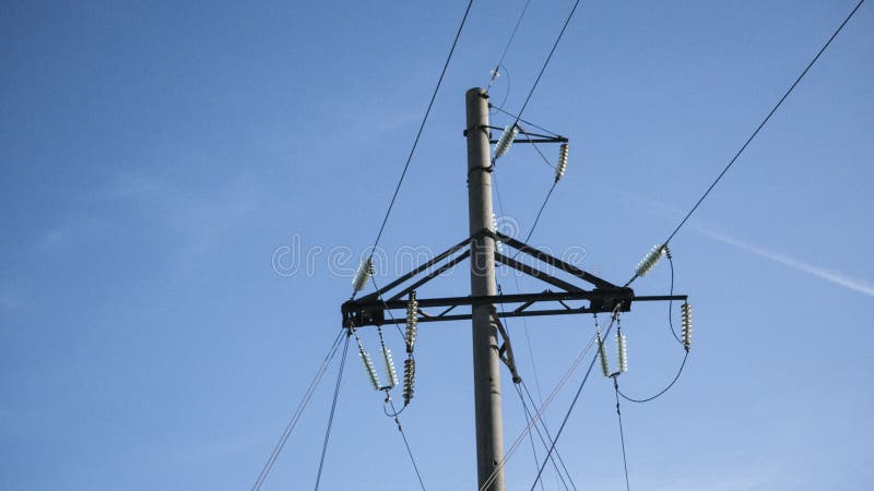 High Voltage Power Lines. Wire Power Source on Poles Stock Image ...