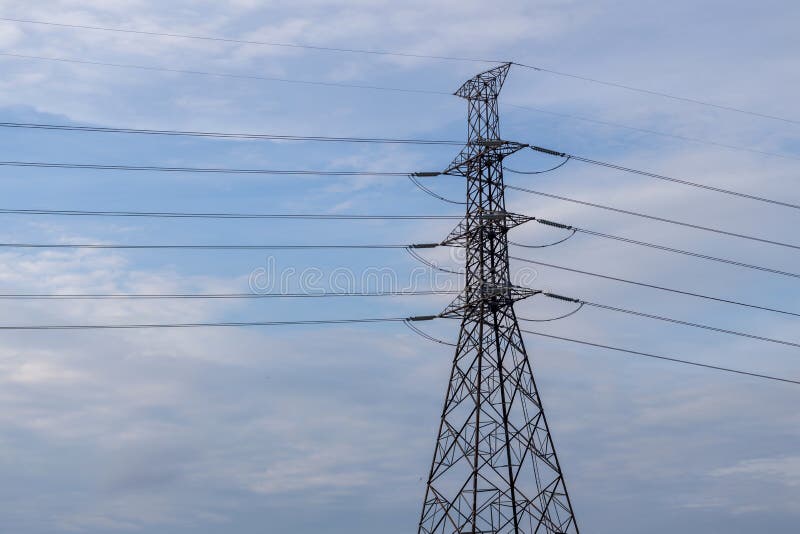 High Voltage Power Tower. High-voltage Power Lines at Sky Background ...