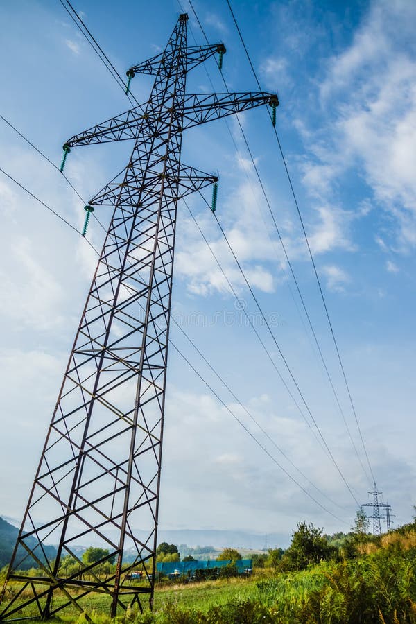 High Voltage, Power Transmission Line on the Mountain Range. Overhead ... High Voltage, Power Transmission Line on the Mountain Range. Overhead ...