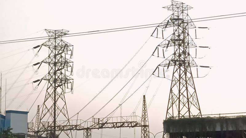 High-voltage Power Transmission Tower with Wires Dangling at a High ...