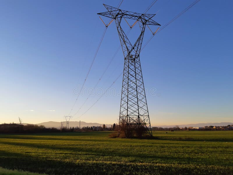 High Voltage Pylon in the Countryside at Sunset Stock Image - Image of ...