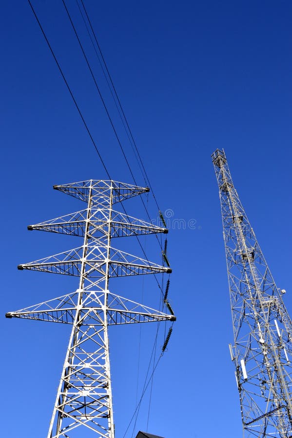 A high voltage pylon stock photo. Image of industrial - 79755130