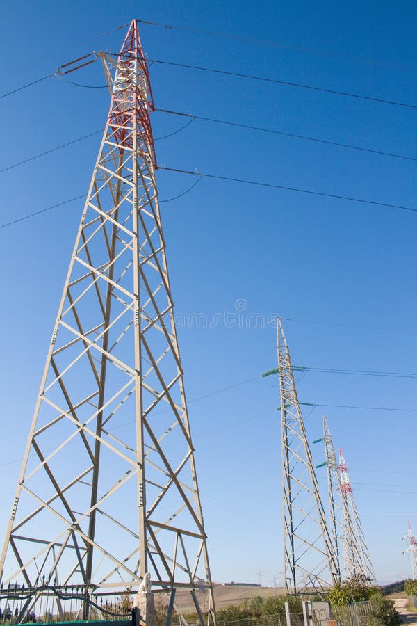 High voltage pylons stock photo. Image of economy, elettrical - 46413546