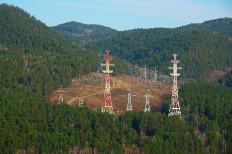 High Voltage Pylons in the Middle of the Forest Stock Image - Image of ...