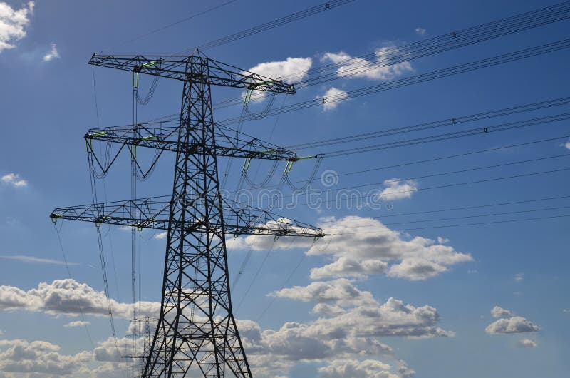 High Voltage Tower with Electricity Transmission Power Lines Against ...