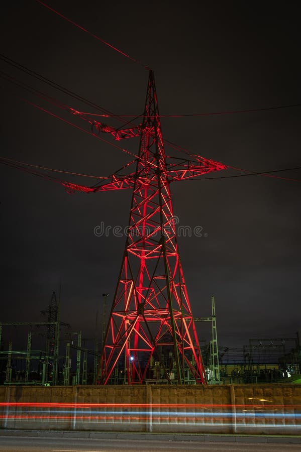 High Voltage Tower Lightened with Red Light in Evening Stock Photo ...