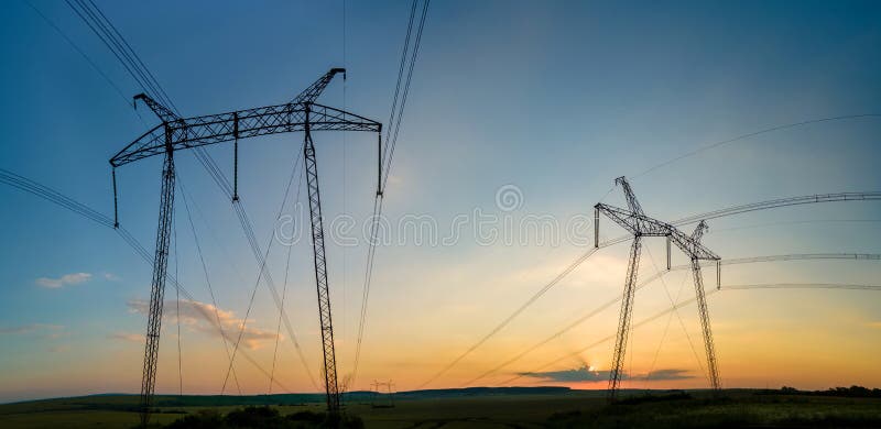 High Voltage Towers with Electric Power Lines at Sunset Stock Image ...