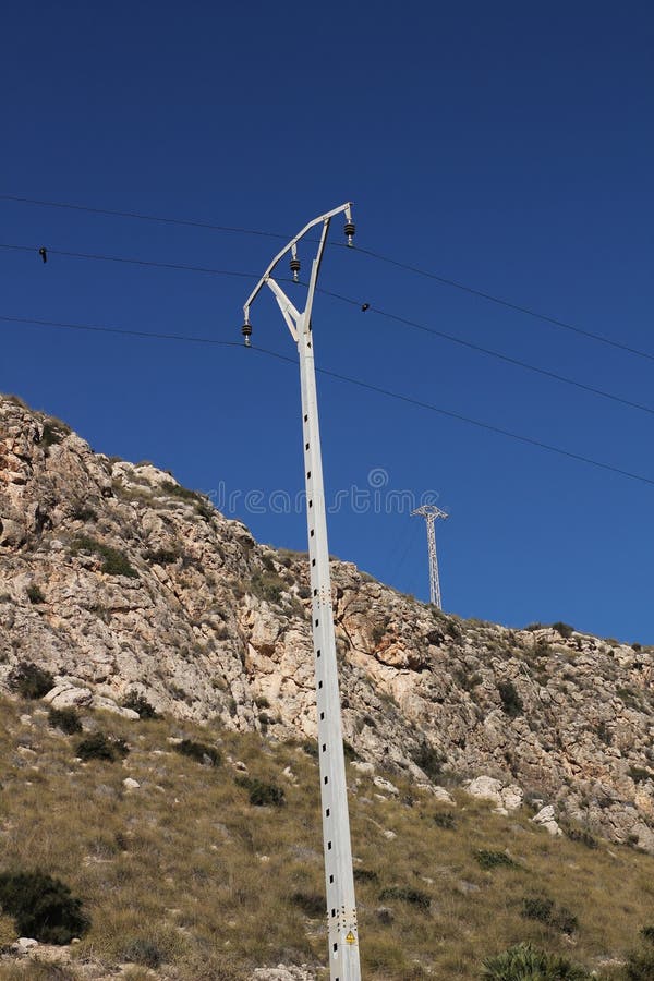 High Voltage Towers in the Mountain Editorial Stock Image - Image of ...