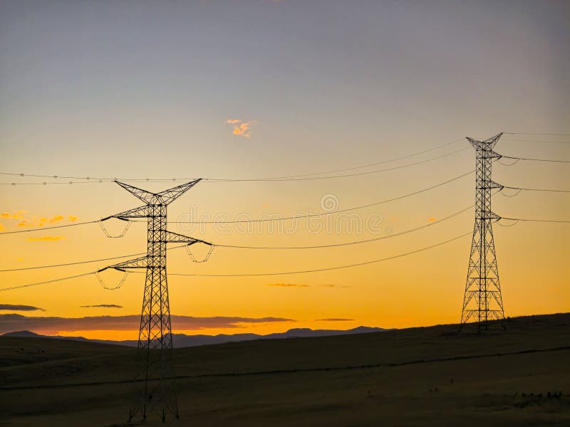 High-voltage Towers at Sunset in the High Andean Mountains Stock Image ...