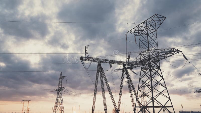 High Voltage Towers at Sunset in the Sky, High Voltage Power Grids ...