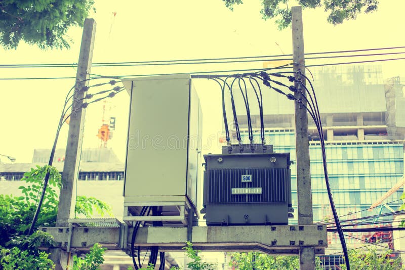 High Voltage Transformer with Control Box on the Electric Tower with ...