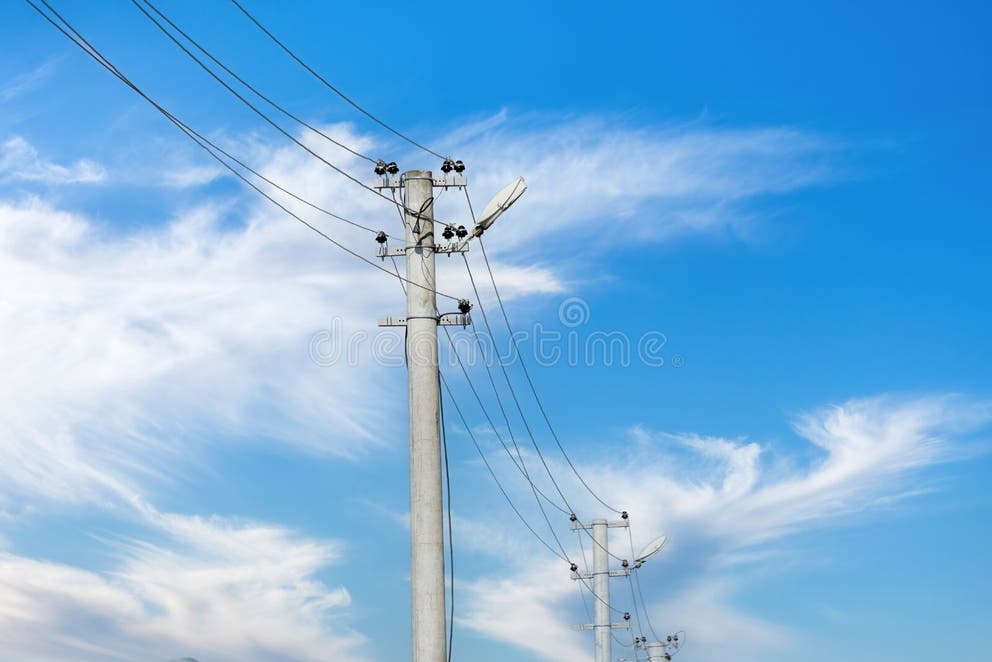 A High Voltage Utility Pole and Tangled Electrical Cables Stock Photo ...