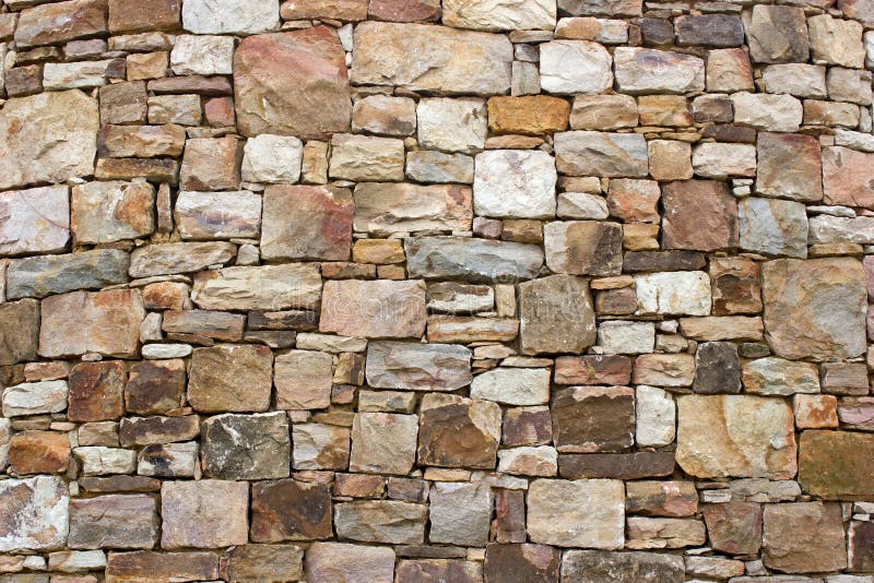 Stone Wall Consisting of Mainly Square Stone Blocks Stock Photo - Image ...