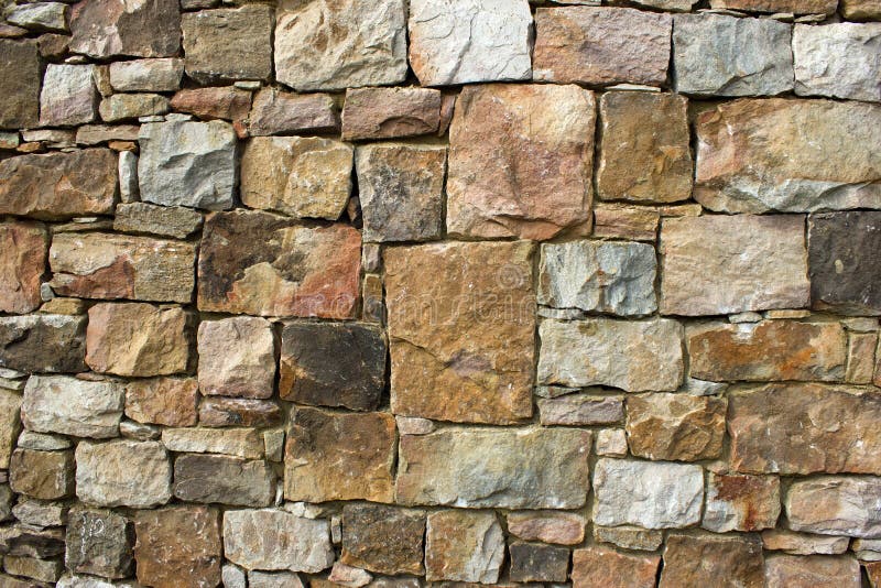 Stone Wall Consisting of Mainly Square Stone Blocks Stock Photo - Image ...