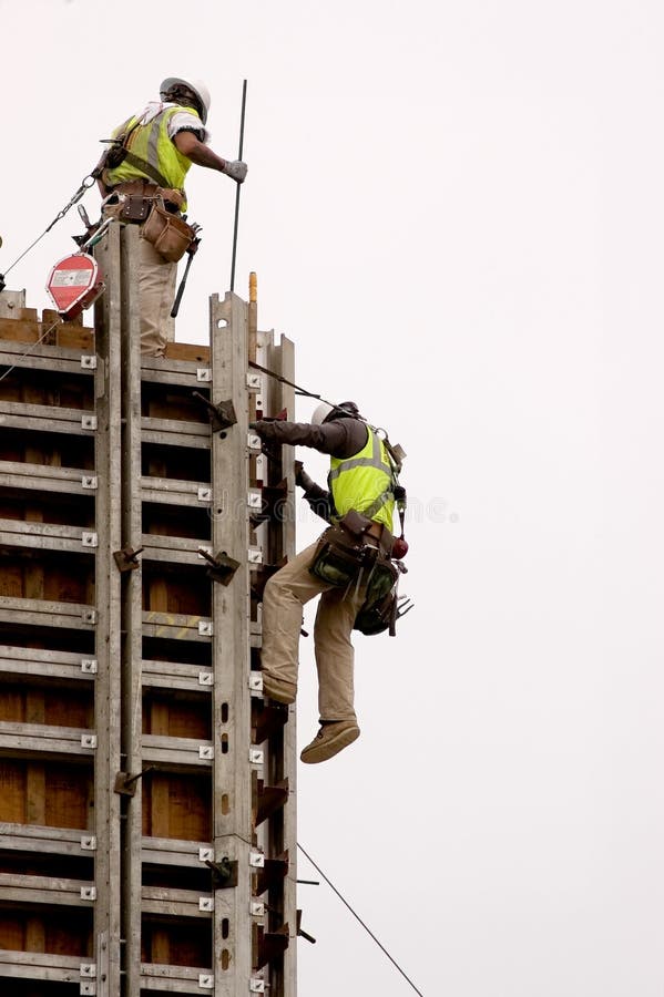 High Wall Worker Against Cloud Stock Photo - Image of build ...