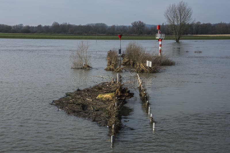 High Water in the River IJssel Stock Image - Image of trees, posts ...