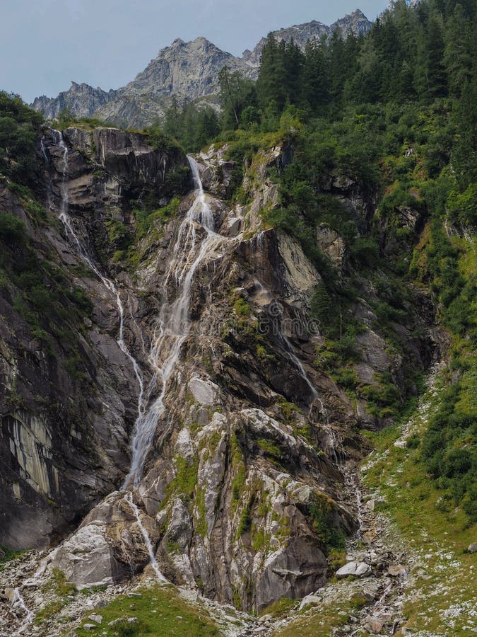 High Waterfall in Mountain Area Stock Photo - Image of climb, flowing ...