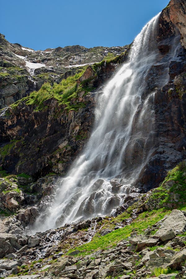High Waterfall in the Mountains Stock Image - Image of bluff, heavy ...