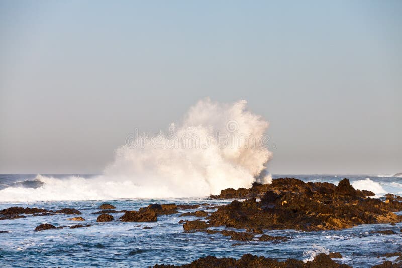 High Wave Breaking on the Rocks Stock Image - Image of beach, rough ...