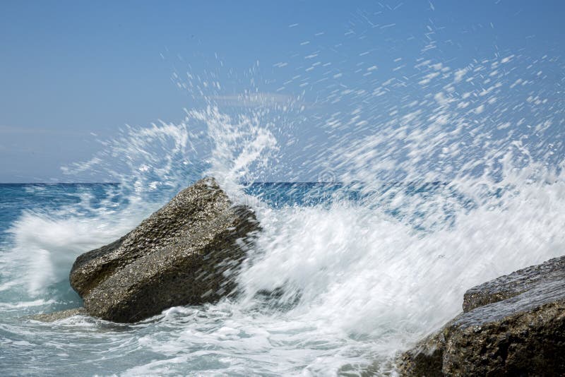 High Wave Breaking on the Rocks of the Coastline. Stock Photo - Image ...
