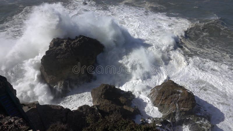 High Waves Breaking on the Rocks of the Coastline Stock Video - Video ...