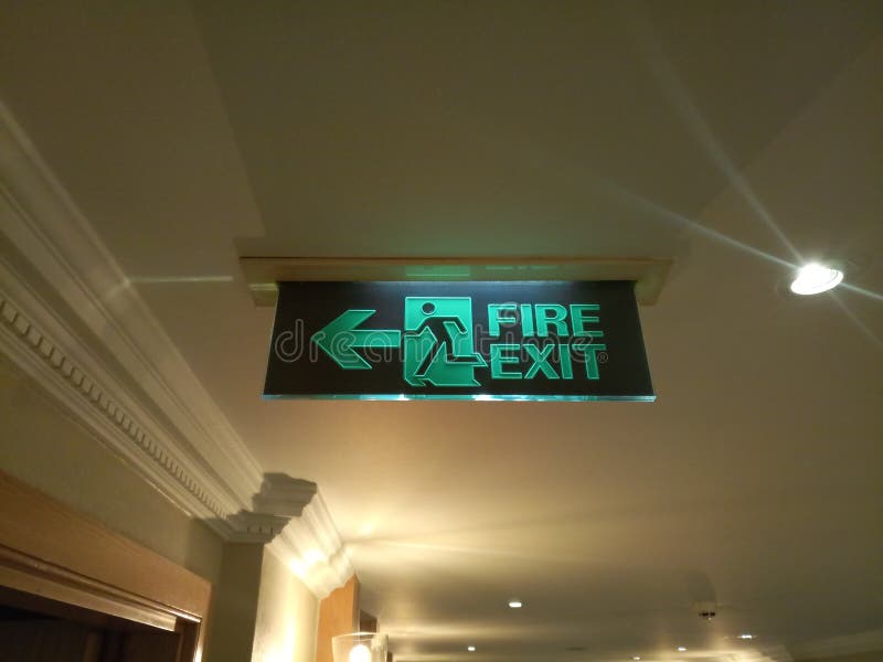 Large Green Fire Exit Sign with a Symbol Stock Image - Image of white ...
