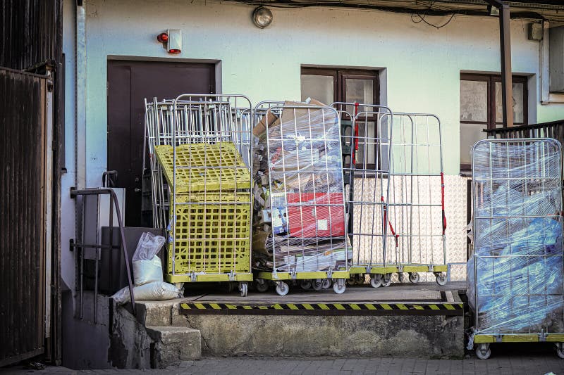 High Wire Trash Containers with Carton Boxes Wrapped in Plastic Wrap ...