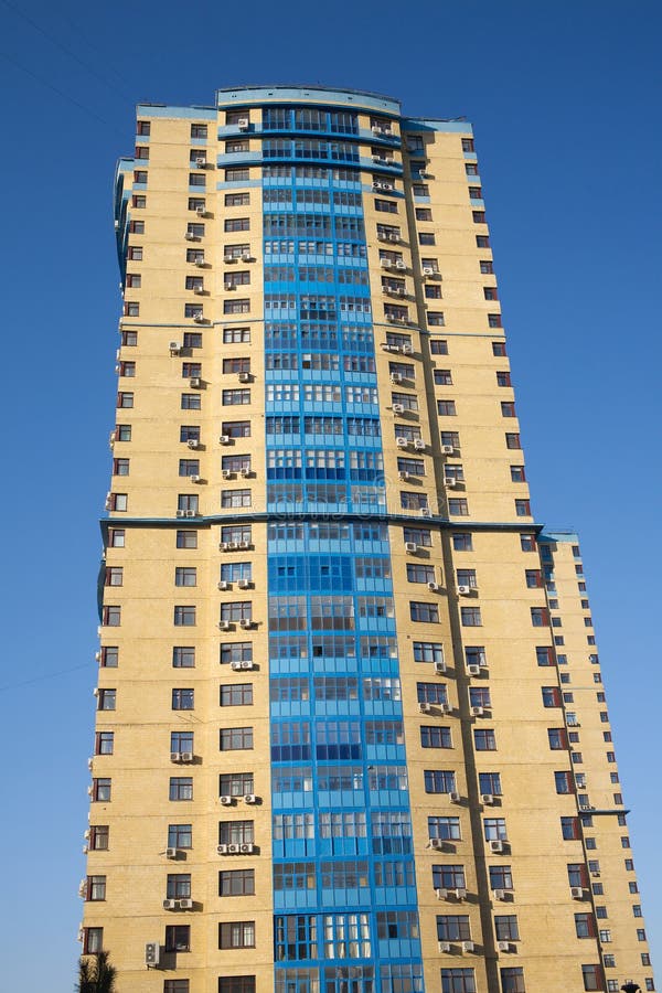 High Yellow Modern Multi-storey Building Over Clear Sky Stock Image ...